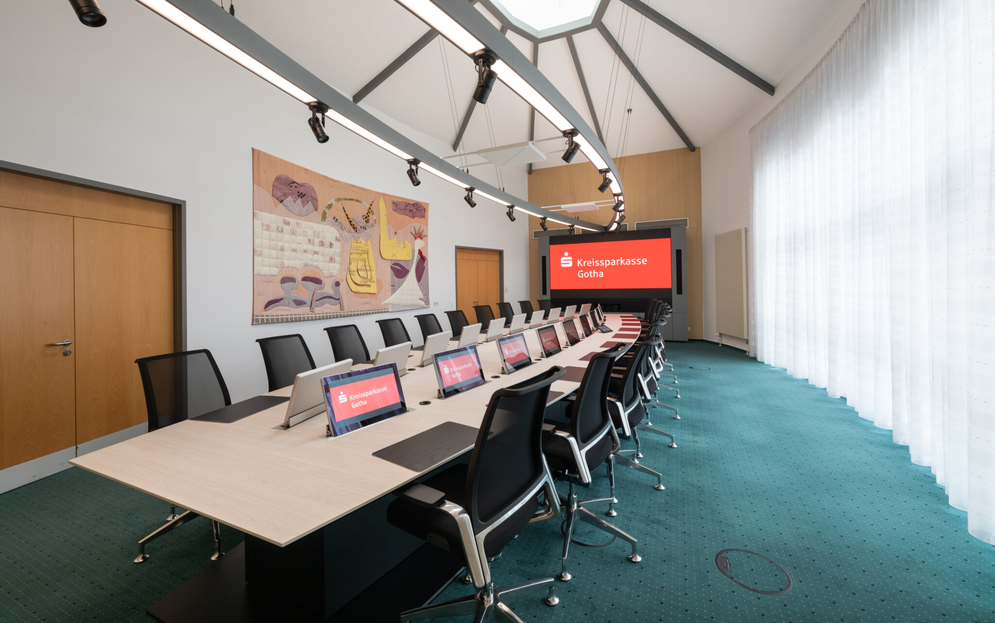 Arthur Holm retractable monitors at the Heart of Sparkasse Gotha’s Meeting Room Transformation ...